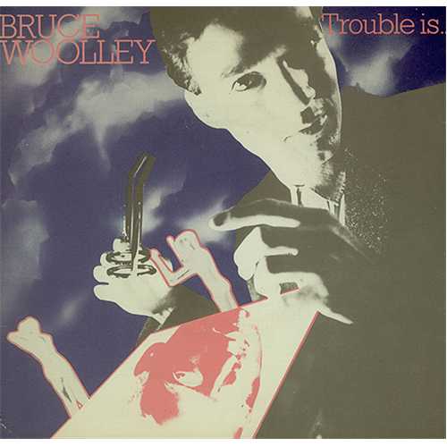 Bruce Woolley Trouble Is... UK 7" vinyl single (7 inch record / 45 ...